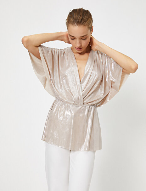 Koton Kadın Büzgülü Yarasa Kol Kruvaze Parlak Bluz Koton Kadın Büzgülü Yarasa Kol Kruvaze Parlak Bluz