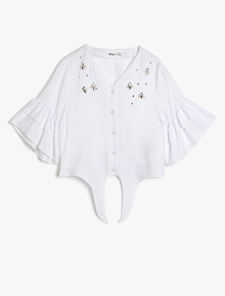 Koton Kız Çocuk Önü Taş İşlemeli Kolu Çift Kat Fırfırlı Düğmeli Etek Ucu Bağlamalı Kısa Kollu Bluz Koton Kız Çocuk Önü Taş İşlemeli Kolu Çift Kat Fırfırlı Düğmeli Etek Ucu Bağlamalı Kısa Kollu Bluz