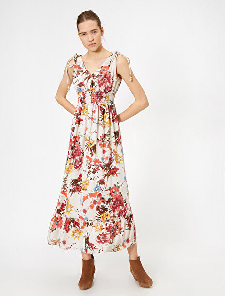 Koton Kadın V Yaka Bağlamalı Çiçek Desenli Kolsuz Uzun Elbise Koton Kadın V Yaka Bağlamalı Çiçek Desenli Kolsuz Uzun Elbise