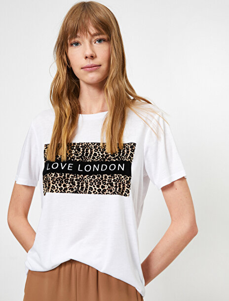 Koton Kadın Leopar Detay Önü Baskılı Bisiklet Yaka Tişört Koton Kadın Leopar Detay Önü Baskılı Bisiklet Yaka Tişört
