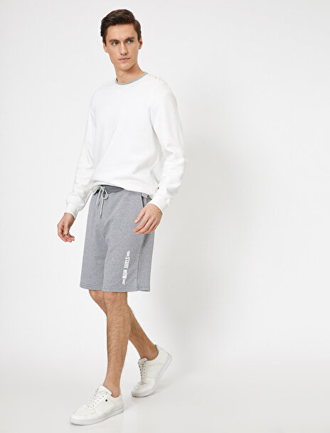 Koton Erkek Yanları Yazılı Baskılı Cepli Şort Koton Erkek Yanları Yazılı Baskılı Cepli Şort