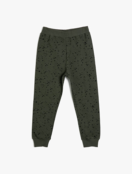 Koton Erkek Çocuk Desenli Yumuşak Tüylü Sweatshirt Kumaşından Ribanalı Jogger Eşofman Altı Koton Erkek Çocuk Desenli Yumuşak Tüylü Sweatshirt Kumaşından Ribanalı Jogger Eşofman Altı