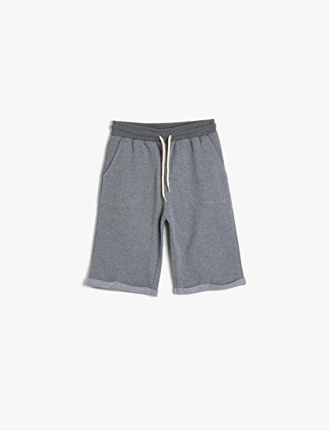 Koton Erkek Çocuk Pike Kumaştan Beli Ribanalı ve Kordonlu Cepli Paçası Kıvrık Şort