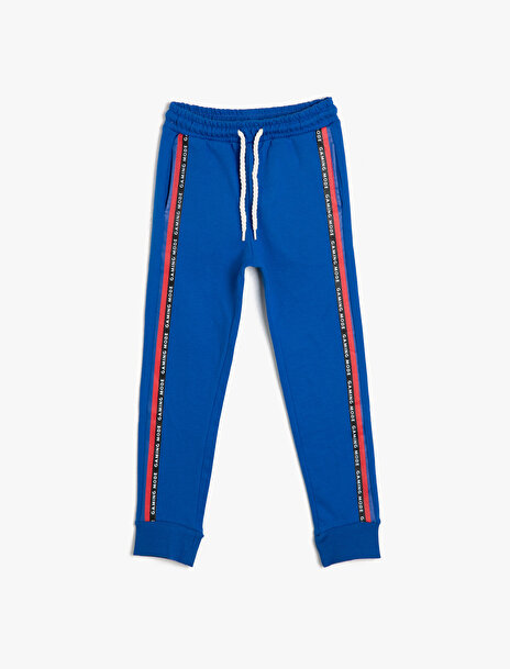 Koton Erkek Çocuk Sweatshirt Kumaşından Beli Kordonlu Paçası Ribanalı Jogger Eşofman Altı Koton Erkek Çocuk Sweatshirt Kumaşından Beli Kordonlu Paçası Ribanalı Jogger Eşofman Altı