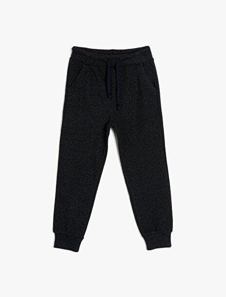 Koton Erkek Çocuk Basic Cepli İçi Yumuşak Tüylü Paçası Ribanalı Jogger Eşofman Altı Koton Erkek Çocuk Basic Cepli İçi Yumuşak Tüylü Paçası Ribanalı Jogger Eşofman Altı