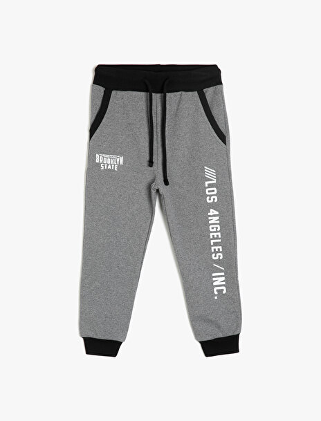 Koton Erkek Çocuk İçi Yumuşak Tüylü Sweatshirt Kumaşından Beli Kordonlu Jogger Eşofman Altı Koton Erkek Çocuk İçi Yumuşak Tüylü Sweatshirt Kumaşından Beli Kordonlu Jogger Eşofman Altı