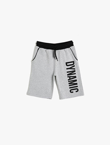 Koton Erkek Çocuk Kontrast Renk Baskılı İnce Sweat Kumaştan Beli Lastikli Kordonlu Şort Koton Erkek Çocuk Kontrast Renk Baskılı İnce Sweat Kumaştan Beli Lastikli Kordonlu Şort