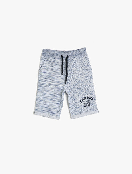 Koton Erkek Çocuk Kırçıllı İnce Sweat Kumaşından Cepli Beli Ribanalı ve Kordonlu Baskılı Şort Koton Erkek Çocuk Kırçıllı İnce Sweat Kumaşından Cepli Beli Ribanalı ve Kordonlu Baskılı Şort