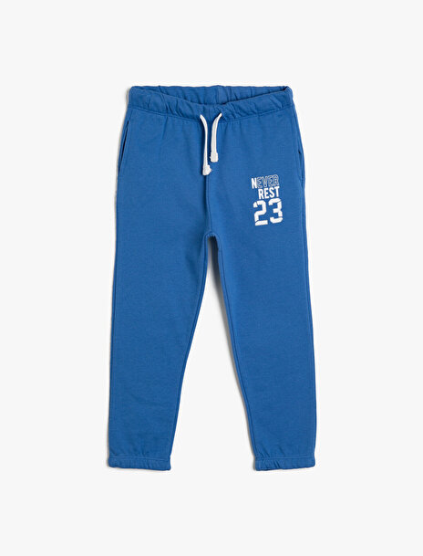 Koton Erkek Çocuk Baskılı Sweatshirt Kumaşından Cep Detaylı Paçası Lastikli Eşofman Altı