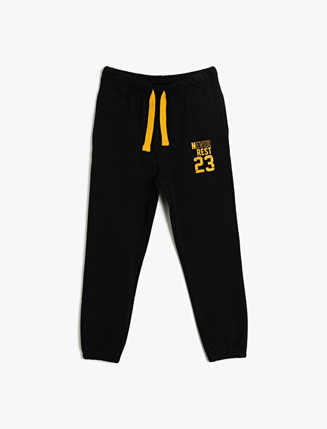 Koton Erkek Çocuk Baskılı Sweatshirt Kumaşından Cep Detaylı Paçası Lastikli Eşofman Altı