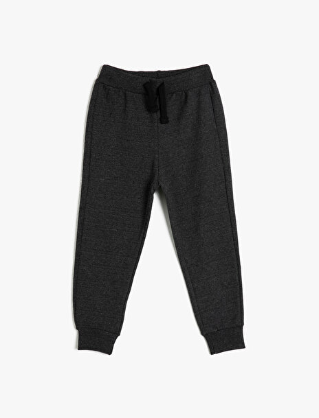 Koton Erkek Çocuk İçi Yumuşak Tüylü Sweatshirt Kumaşından Paçası Ribanalı Jogger Eşofman Altı Koton Erkek Çocuk İçi Yumuşak Tüylü Sweatshirt Kumaşından Paçası Ribanalı Jogger Eşofman Altı