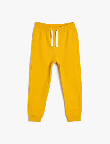 Koton Erkek Çocuk İçi Yumuşak Tüylü Sweatshirt Kumaşından Paçası Ribanalı Jogger Eşofman Altı Koton Erkek Çocuk İçi Yumuşak Tüylü Sweatshirt Kumaşından Paçası Ribanalı Jogger Eşofman Altı