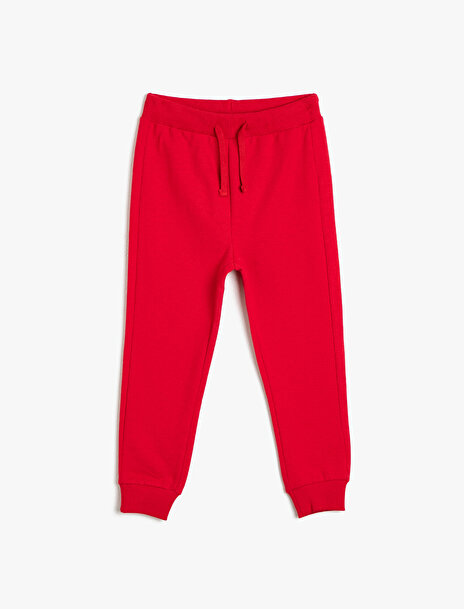 Koton Erkek Çocuk İçi Yumuşak Tüylü Sweatshirt Kumaşından Paçası Ribanalı Jogger Eşofman Altı Koton Erkek Çocuk İçi Yumuşak Tüylü Sweatshirt Kumaşından Paçası Ribanalı Jogger Eşofman Altı