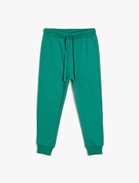 Koton Erkek Çocuk İçi Yumuşak Tüylü Sweatshirt Kumaşından Paçası Ribanalı Jogger Eşofman Altı Koton Erkek Çocuk İçi Yumuşak Tüylü Sweatshirt Kumaşından Paçası Ribanalı Jogger Eşofman Altı