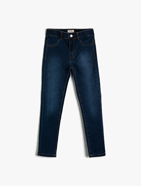 Koton Kız Çocuk İndigo Esnek Denim Kumaşından Beli Ayar Lastikli Normal Bel Jean Pantolon Koton Kız Çocuk İndigo Esnek Denim Kumaşından Beli Ayar Lastikli Normal Bel Jean Pantolon