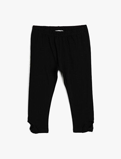 Koton Kız Çocuk Paçası Fiyonklu İnce Esnek Kumaştan Normal Bel Diz Altı Capri Tayt Koton Kız Çocuk Paçası Fiyonklu İnce Esnek Kumaştan Normal Bel Diz Altı Capri Tayt