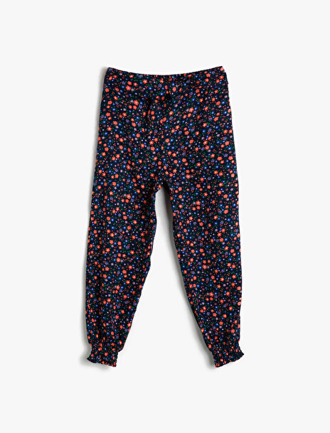 Koton Kız Çocuk Çiçekli Dökümlü Kumaştan Beli Lastikli Bol Harem Pantolon
