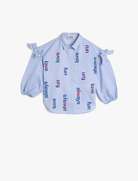 Koton Kız Çocuk Çizgili Poplin Kumaştan Yazılı Baskılı Kolunda Fiyonklu Gömlek Koton Kız Çocuk Çizgili Poplin Kumaştan Yazılı Baskılı Kolunda Fiyonklu Gömlek