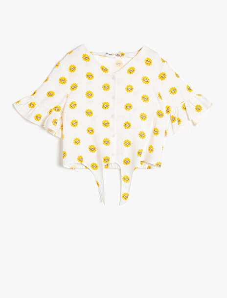 Koton Kız Çocuk Çiçekli Dökümlü Kumaştan Fırfırlı Düğmeli Kısa Kollu Gömlek