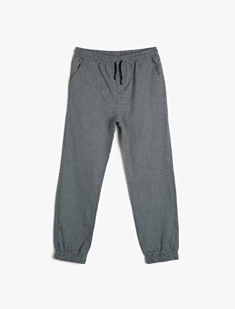 Koton Erkek Çocuk Pamuklu Belden Bağlamalı Normal Bel Jogger Pantolon Koton Erkek Çocuk Pamuklu Belden Bağlamalı Normal Bel Jogger Pantolon