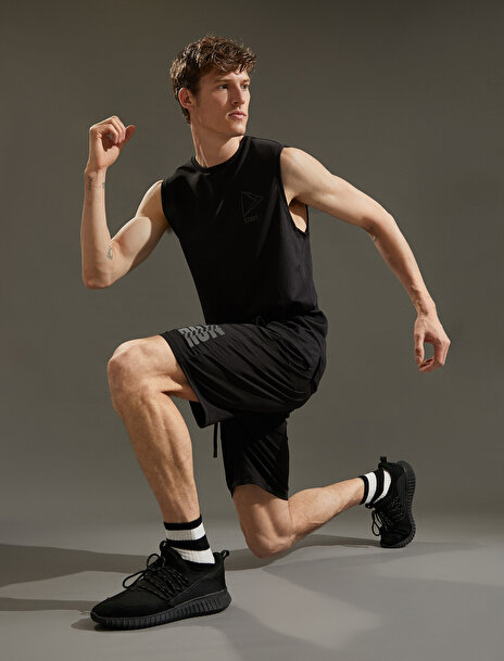 Koton Erkek Sloganlı Şort Relaxed Fit Çift Cepli Koton Erkek Sloganlı Şort Relaxed Fit Çift Cepli