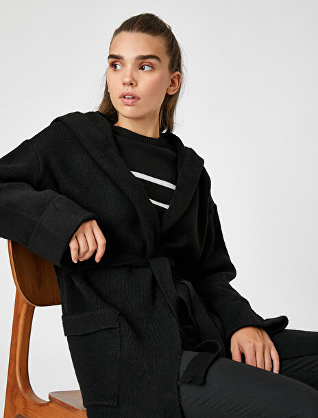 Koton Kadın Beli Kuşaklı Kapüşonlu Duble Kol Ucu Triko Yelek Koton Kadın Beli Kuşaklı Kapüşonlu Duble Kol Ucu Triko Yelek