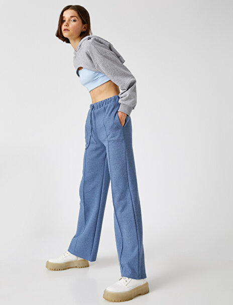 Koton Ole Genç Kız Beli Bağcıklı Pantolon Geniş Paça Önden Şeritli Koton Ole Genç Kız Beli Bağcıklı Pantolon Geniş Paça Önden Şeritli