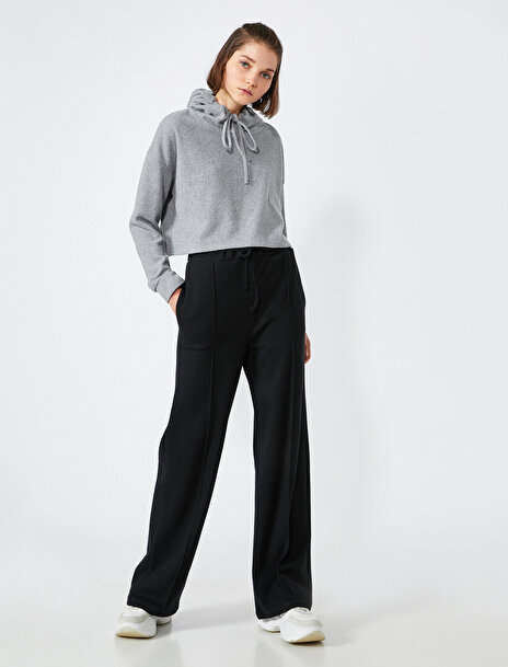 Koton Ole Genç Kız Beli Bağcıklı Pantolon Geniş Paça Önden Şeritli Koton Ole Genç Kız Beli Bağcıklı Pantolon Geniş Paça Önden Şeritli