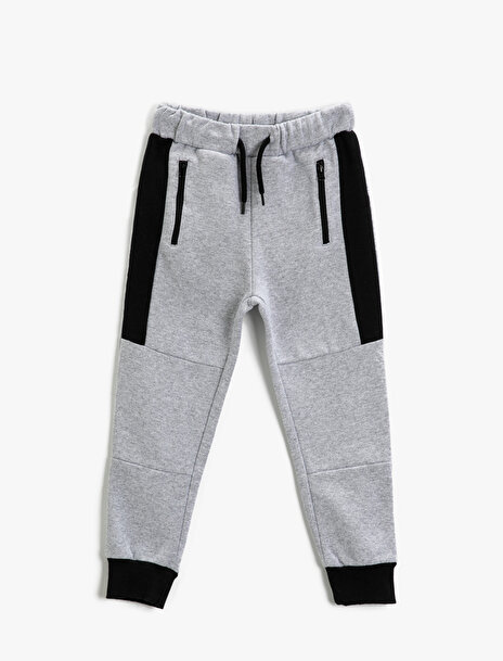 Koton Erkek Çocuk Şeritli Jogger Eşofman Altı Beli Bağlamalı Cepli Koton Erkek Çocuk Şeritli Jogger Eşofman Altı Beli Bağlamalı Cepli