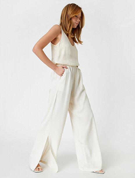 Koton Kadın Paçası Yırtmaçlı Beli Lastikli Bol Paça Pantolon