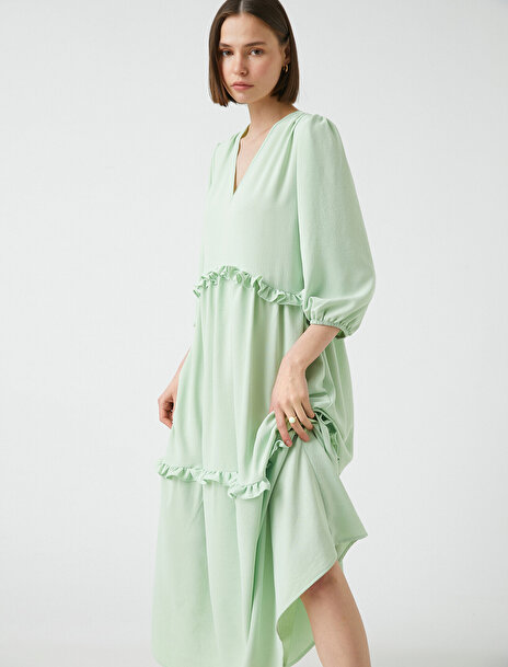 Koton Kadın V Yaka Dökümlü Rahat Kesim Fırfırlı Uzun Elbise Koton Kadın V Yaka Dökümlü Rahat Kesim Fırfırlı Uzun Elbise