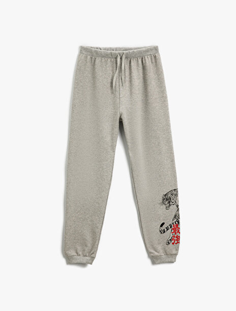 Koton Erkek Çocuk Kaplan Baskılı Jogger Eşofman Altı Beli Bağcıklı Koton Erkek Çocuk Kaplan Baskılı Jogger Eşofman Altı Beli Bağcıklı