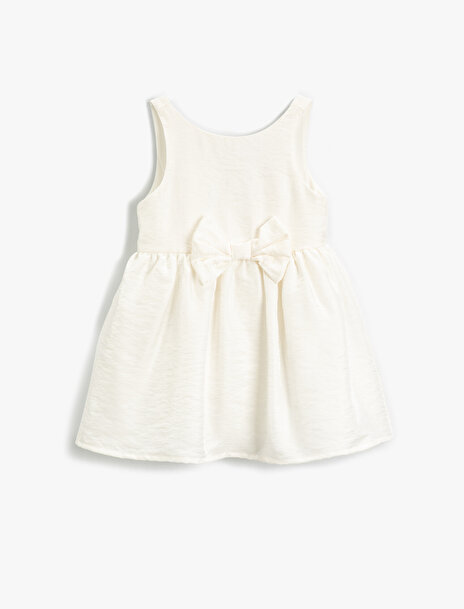 Koton Kız Çocuk Kolsuz Midi Elbise Fiyonk Detaylı Koton Kız Çocuk Kolsuz Midi Elbise Fiyonk Detaylı