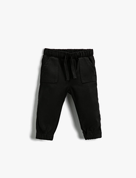 Koton Erkek Çocuk Jogger Pantolon Belden Bağlamalı Cepli Koton Erkek Çocuk Jogger Pantolon Belden Bağlamalı Cepli