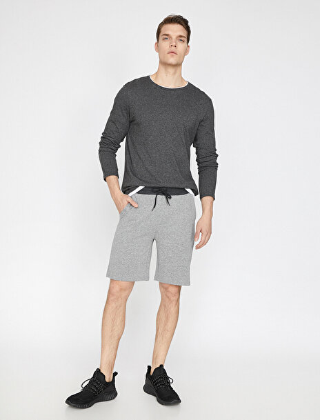 Koton Erkek Cep Detaylı Beli Bağlamalı Desenli Kumaş Şort Koton Erkek Cep Detaylı Beli Bağlamalı Desenli Kumaş Şort